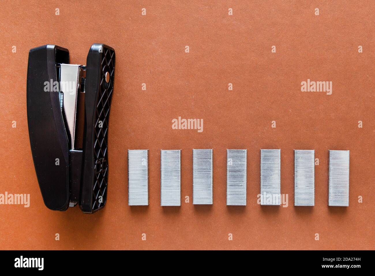 A set of office supplies. Stapler and staples Stock Photo - Alamy