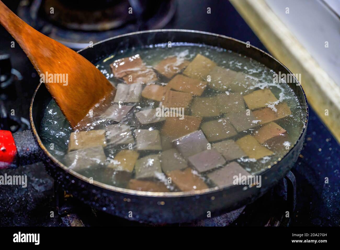 A chef is making pork blood soup Stock Photo - Alamy