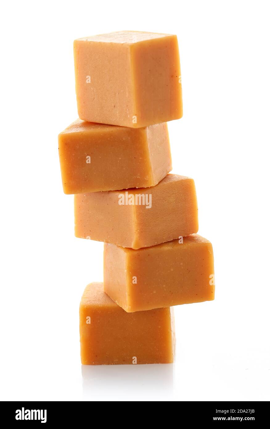 stack of caramel candies isolated on white background Stock Photo - Alamy