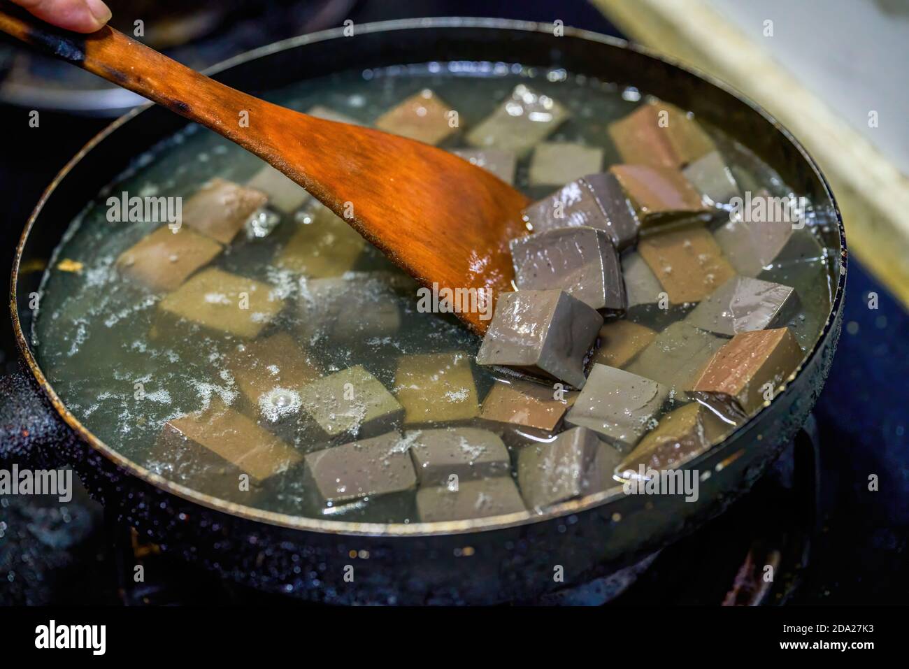 A chef is making pork blood soup Stock Photo - Alamy