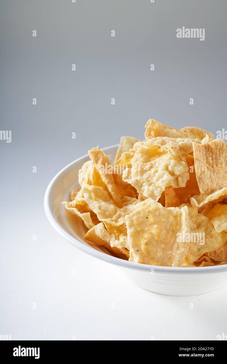 Closeup of a bowl of golden tempting fried yuba Stock Photo - Alamy