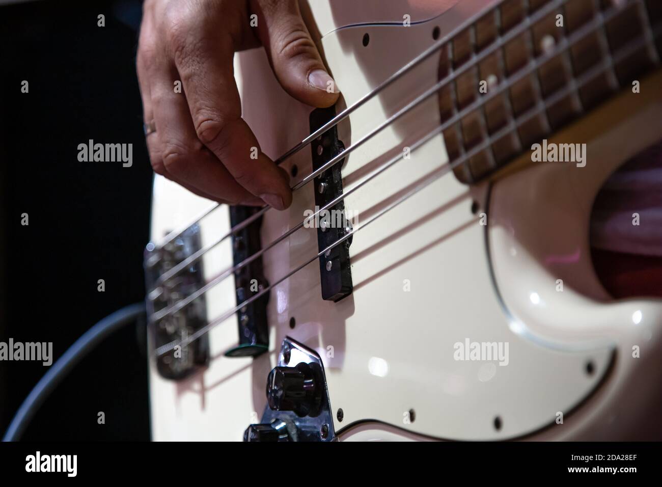 Process of playing the electric guitar close-up Stock Photo - Alamy