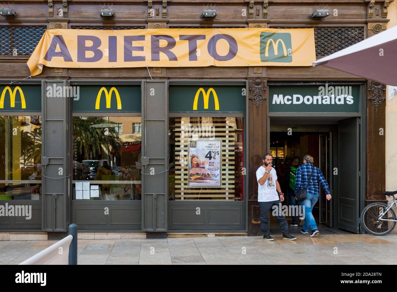 A man seen smoking in front of the fast food restaurant McDonald´s ...