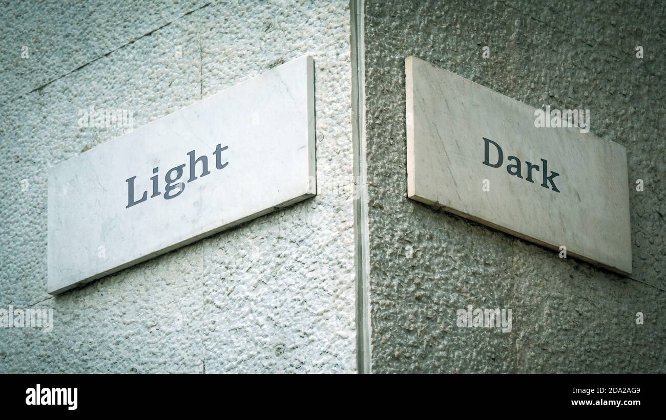 Street Sign the Direction Way to Light versus Dark Stock Photo - Alamy