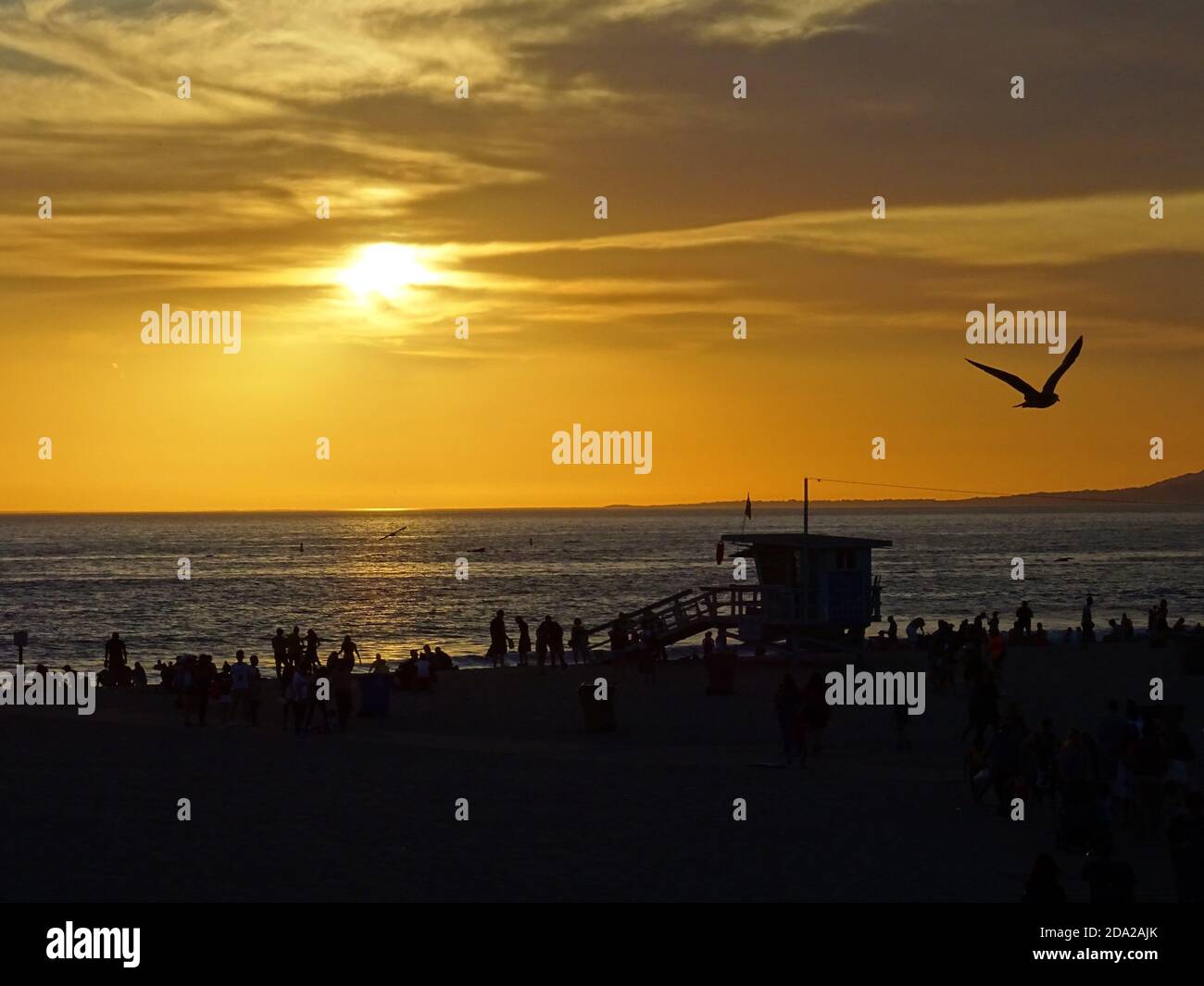 sunset at Venice beach, Los Angeles, California, USA with people ...