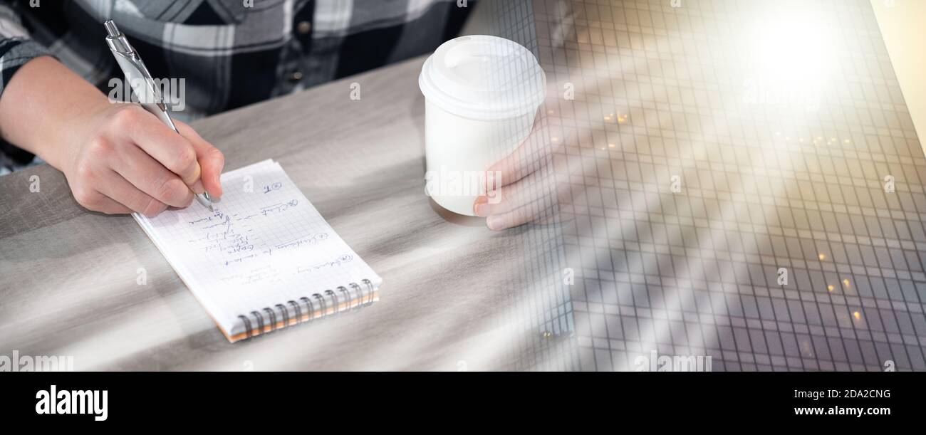 Female hands taking notes on notepad; multiple exposure Stock Photo - Alamy