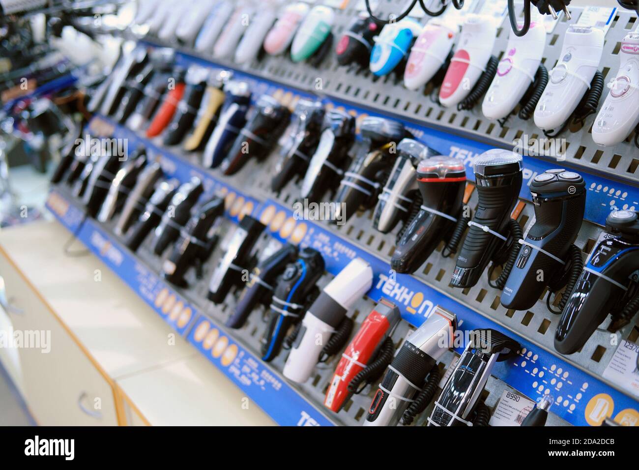 Sale of razors and epilators in the store Stock Photo - Alamy