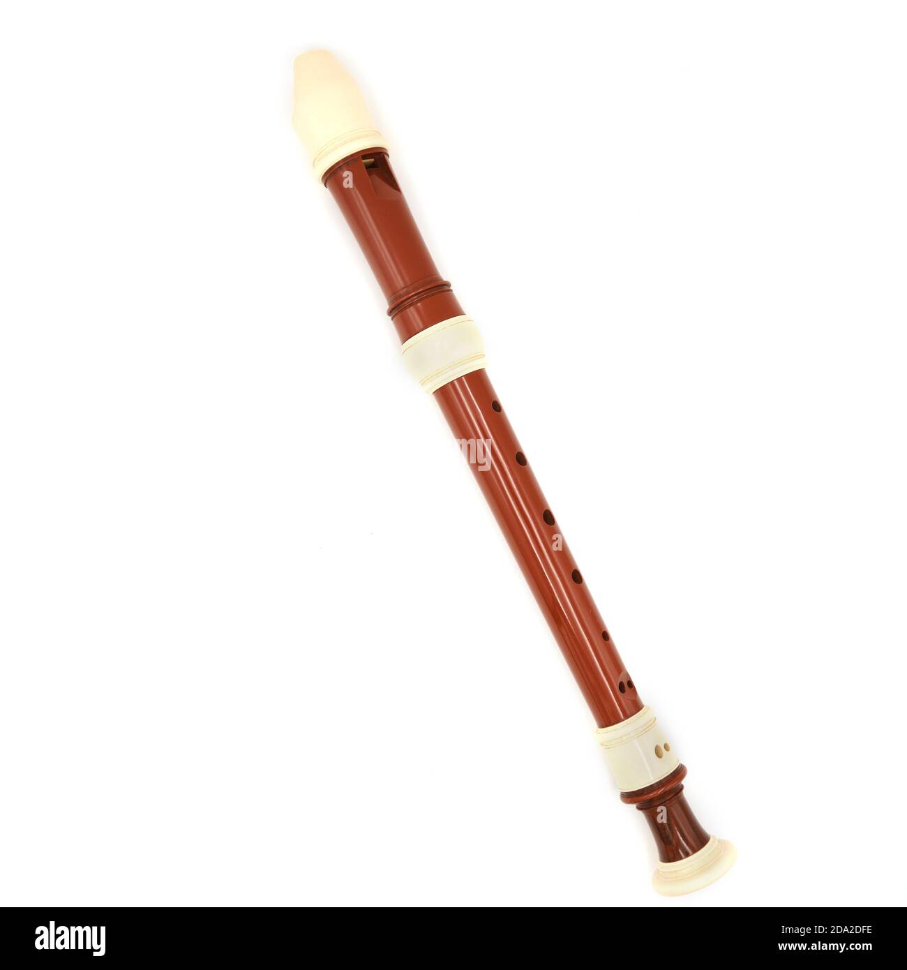 A flute recorder on a white isolated background Stock Photo - Alamy