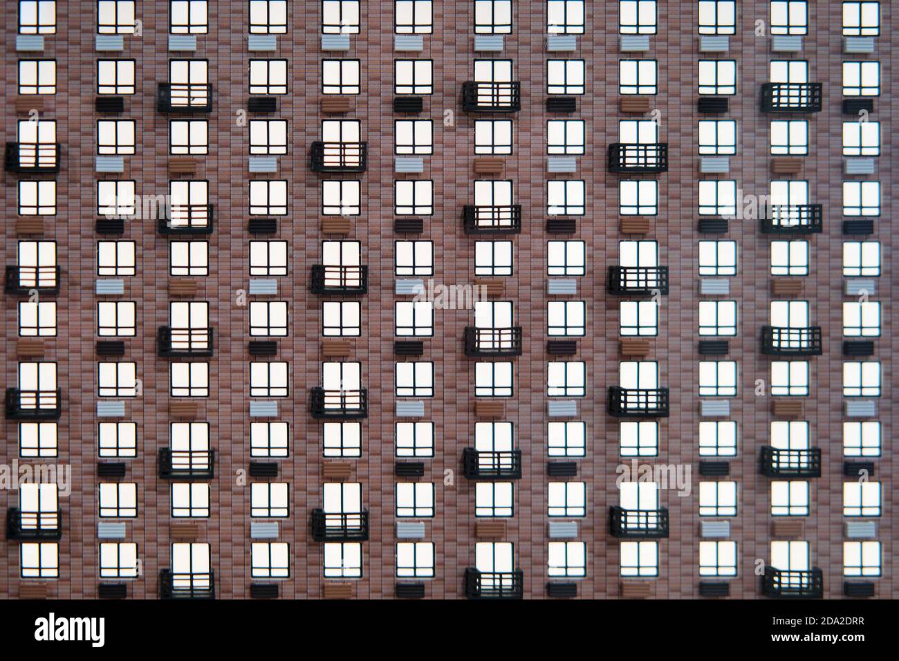 Windows on the facade of the brown building, background. Close-up ...