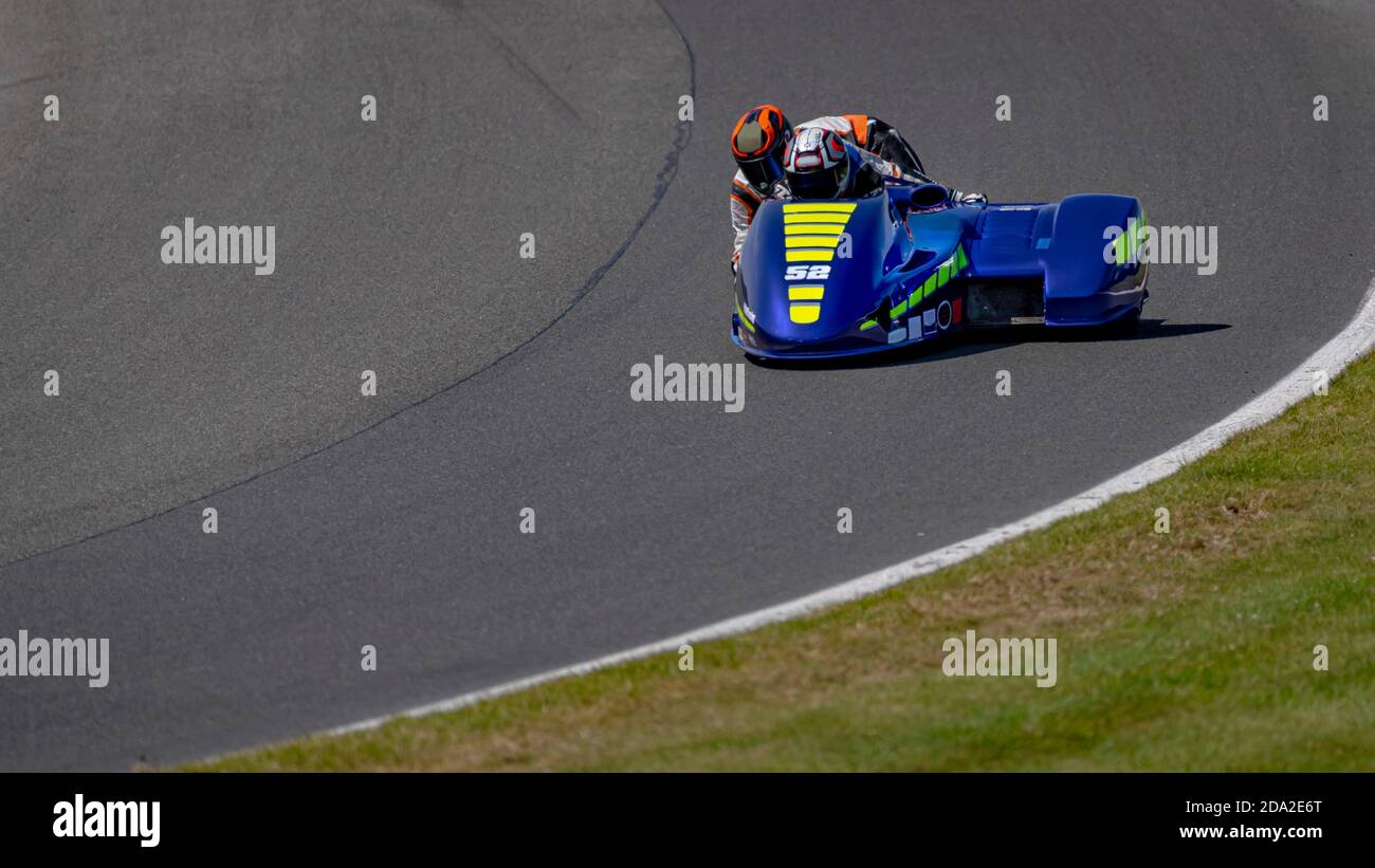 A shot of a racing sidecar as it corners on a track Stock Photo - Alamy