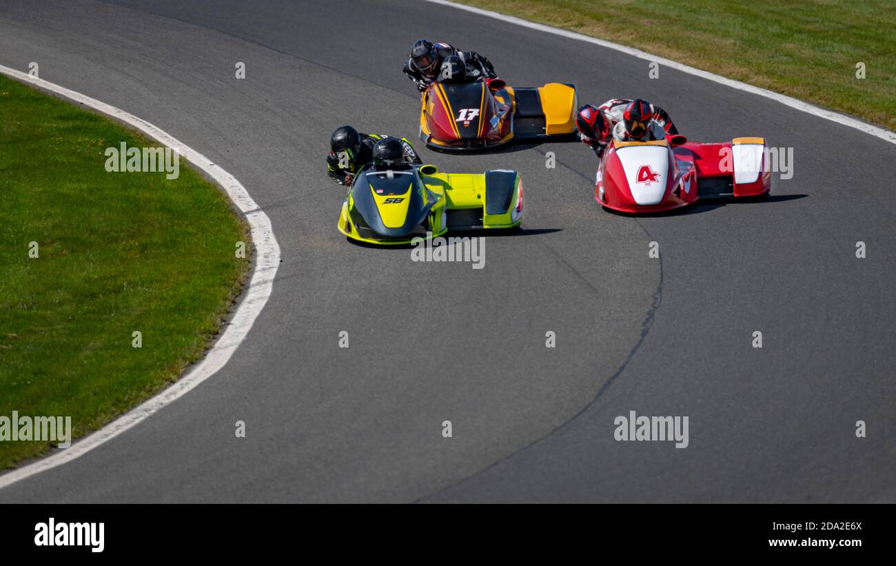 A shot of a racing sidecar as it corners on a track Stock Photo - Alamy