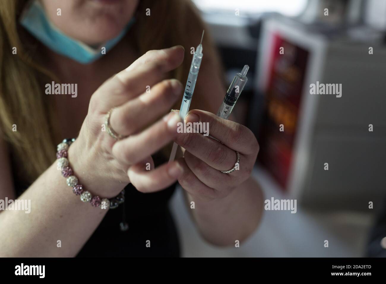 Drug addicts prepare and inject their heroin and drugs, inside the Safe ...