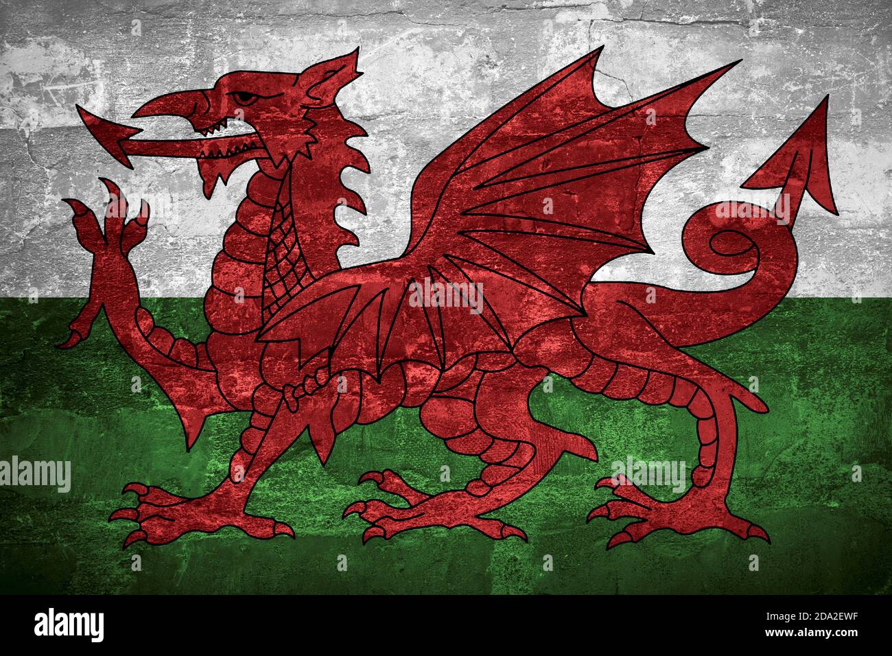 Flag of Wales or Welsh banner on wall background Stock Photo - Alamy