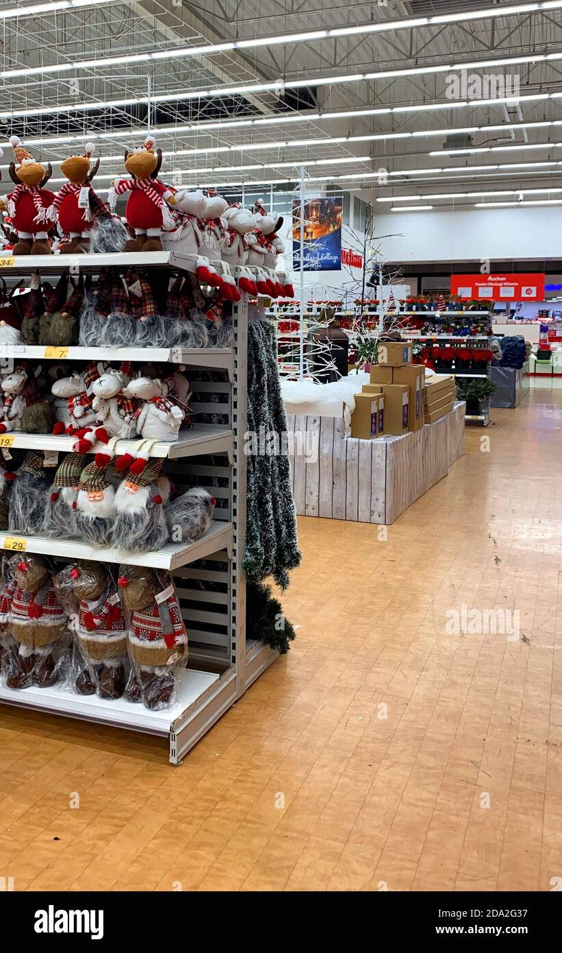 the shelves of a huge store are filled with Christmas paraphernalia ...