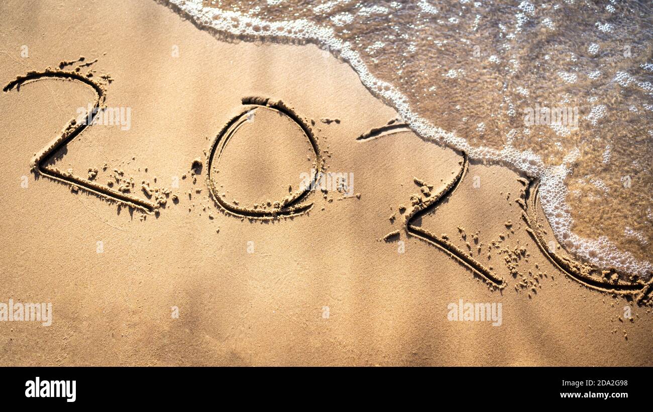 2020 written in sand hi-res stock photography and images - Alamy