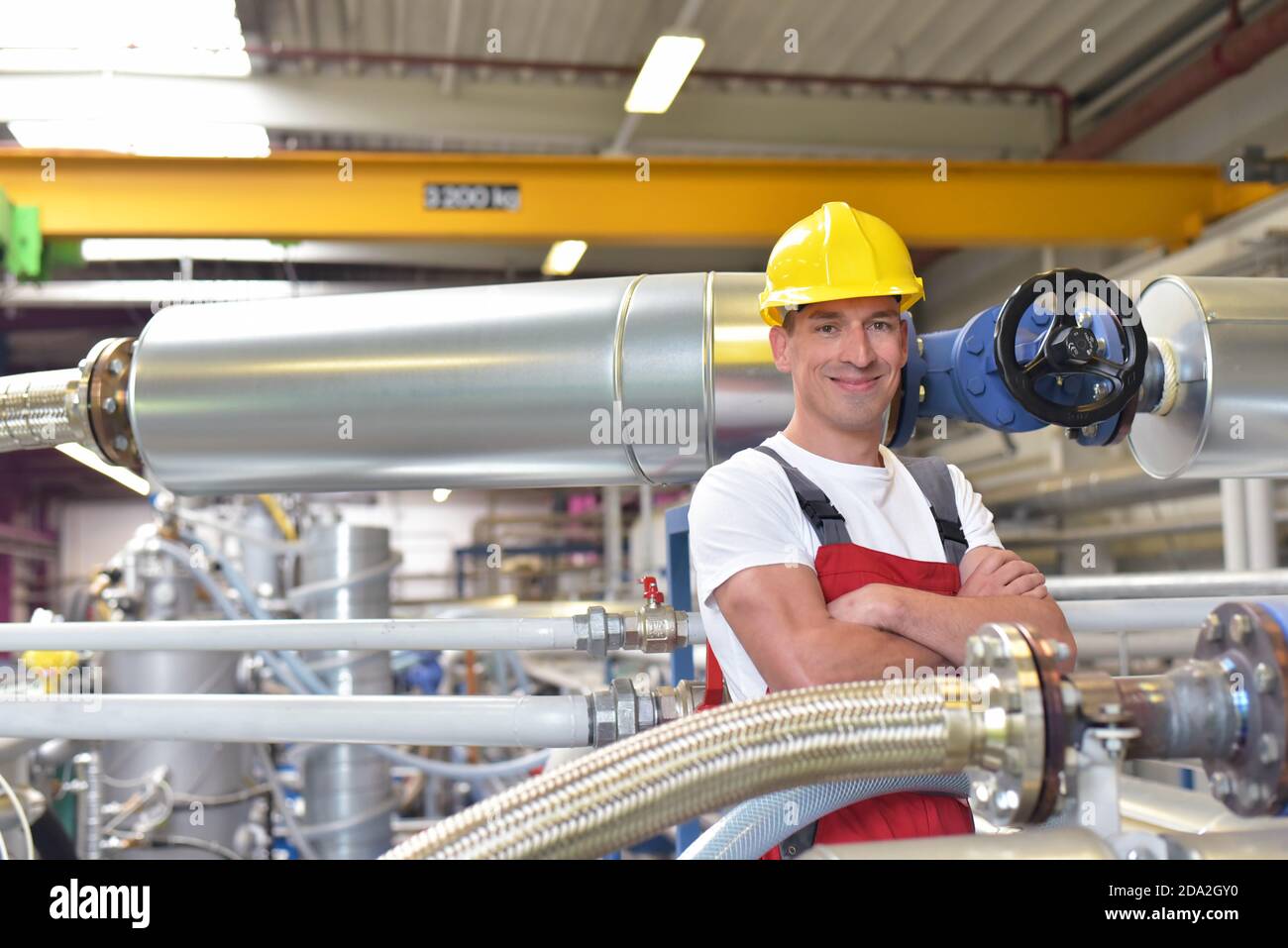 portrait of successful smiling workers/ engineers on site in an ...