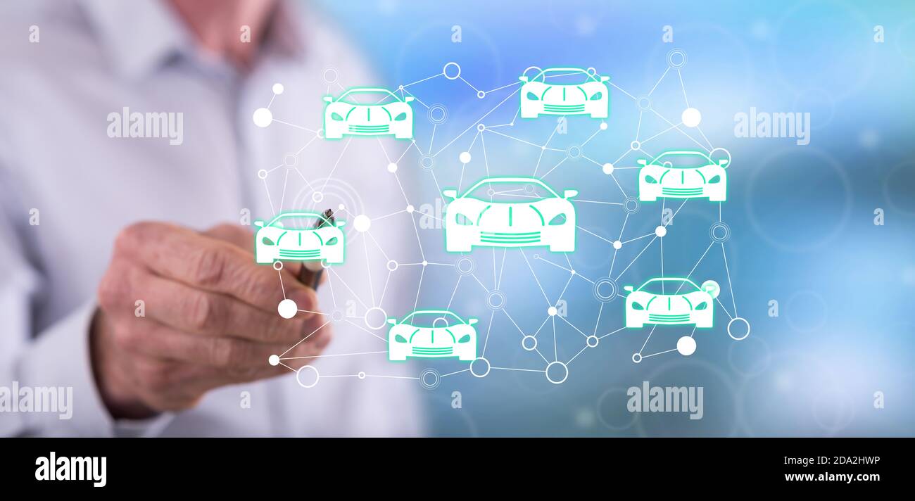 Man touching a smart car concept on a touch screen with a pen Stock ...