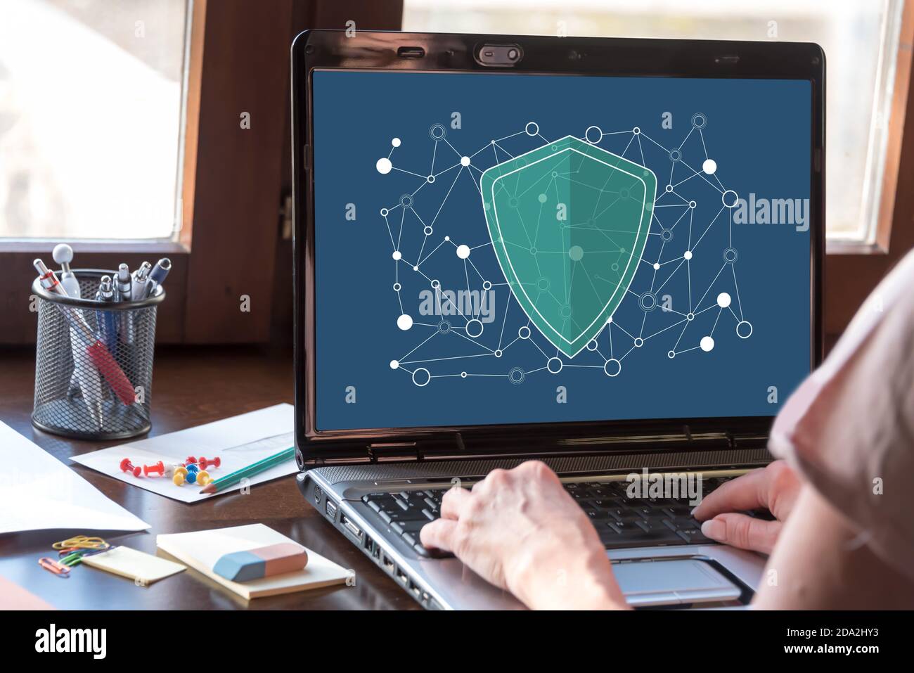 Laptop screen displaying a network safety concept Stock Photo - Alamy