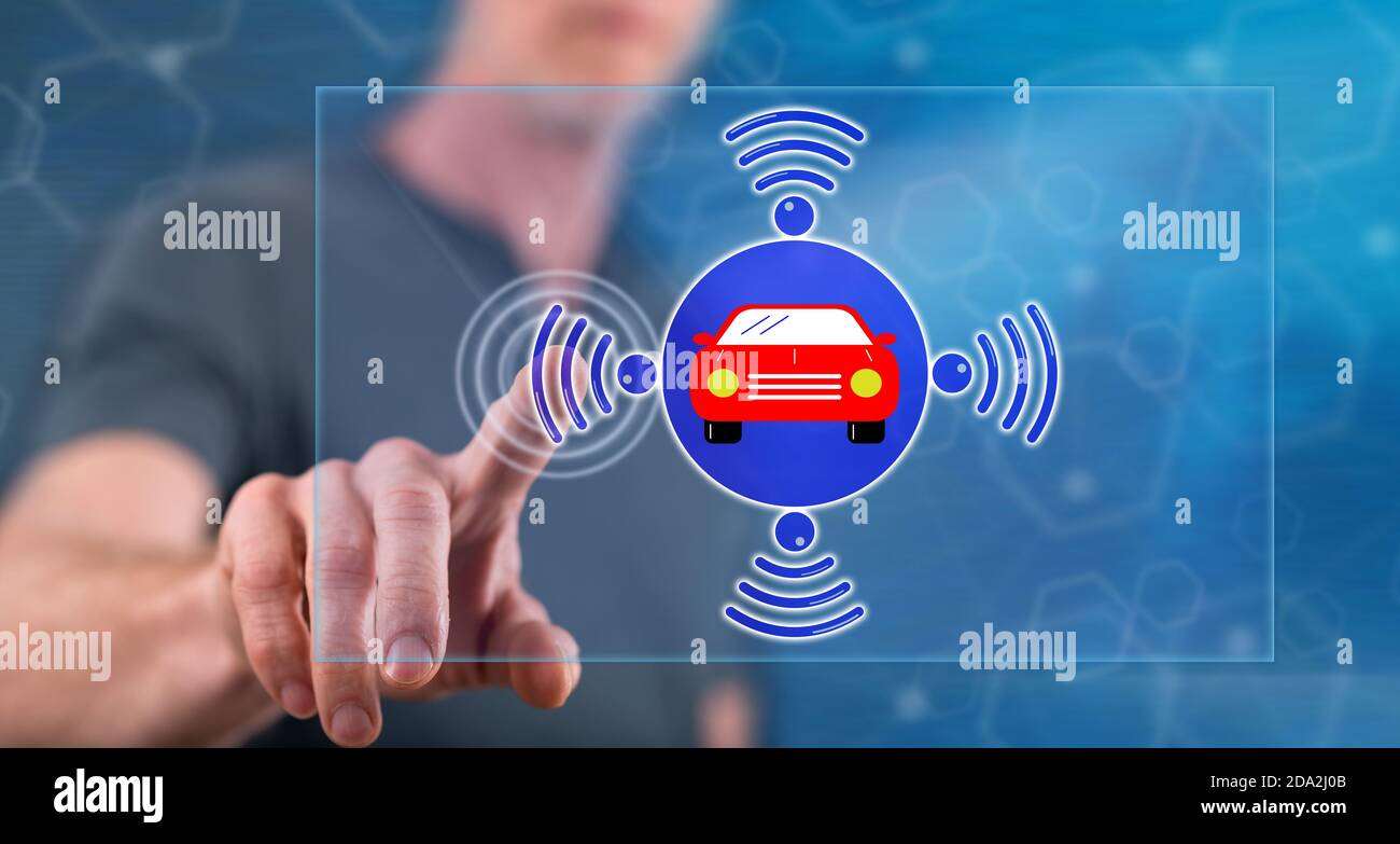 Man touching a smart car concept on a touch screen with his finger ...
