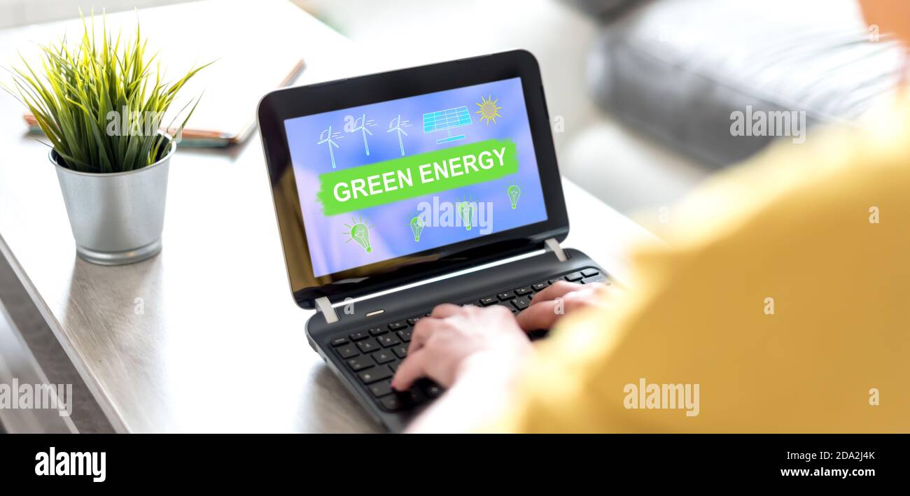 Laptop screen displaying a green energy concept Stock Photo - Alamy