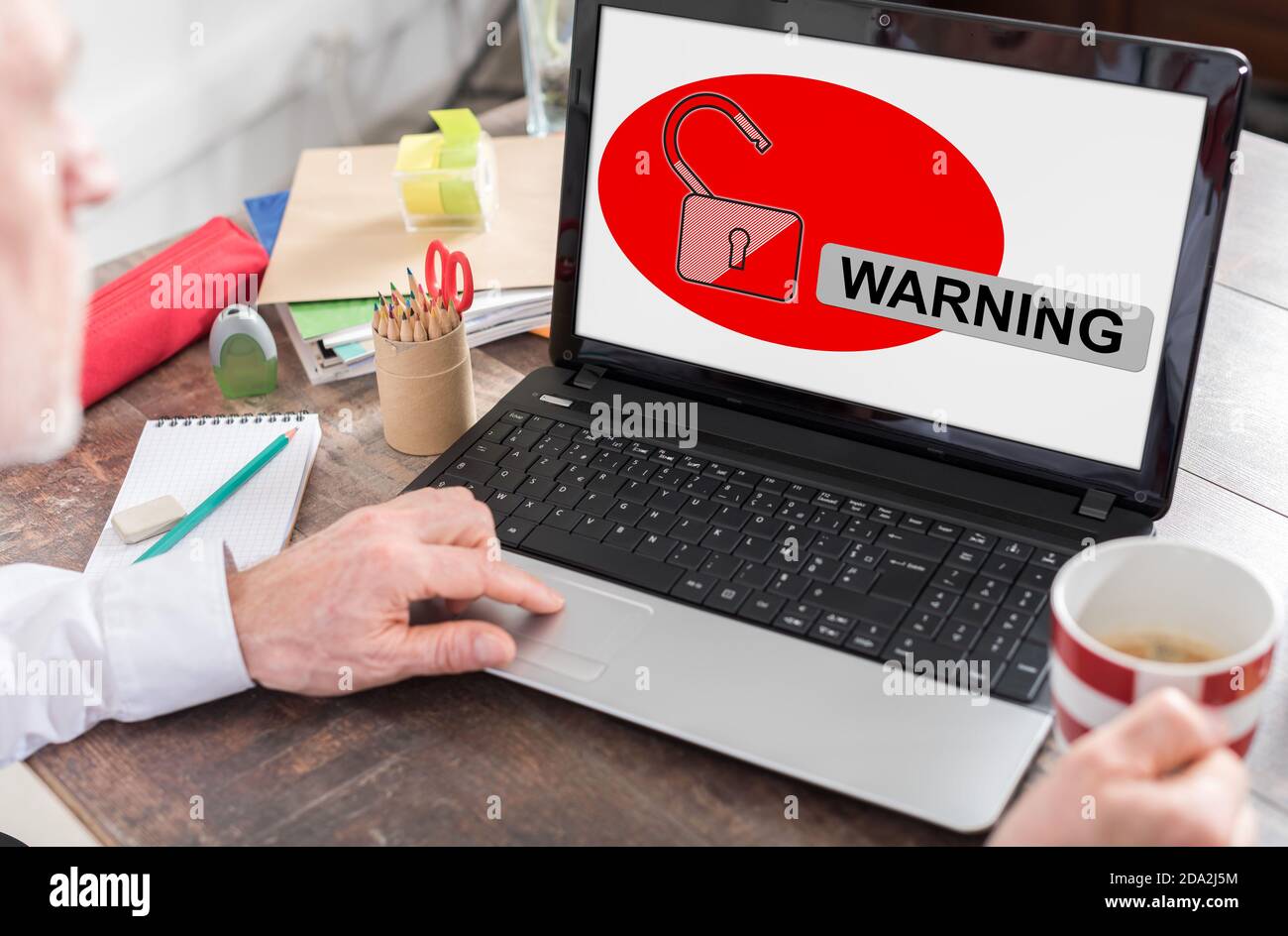 Warning concept shown on a laptop screen Stock Photo - Alamy