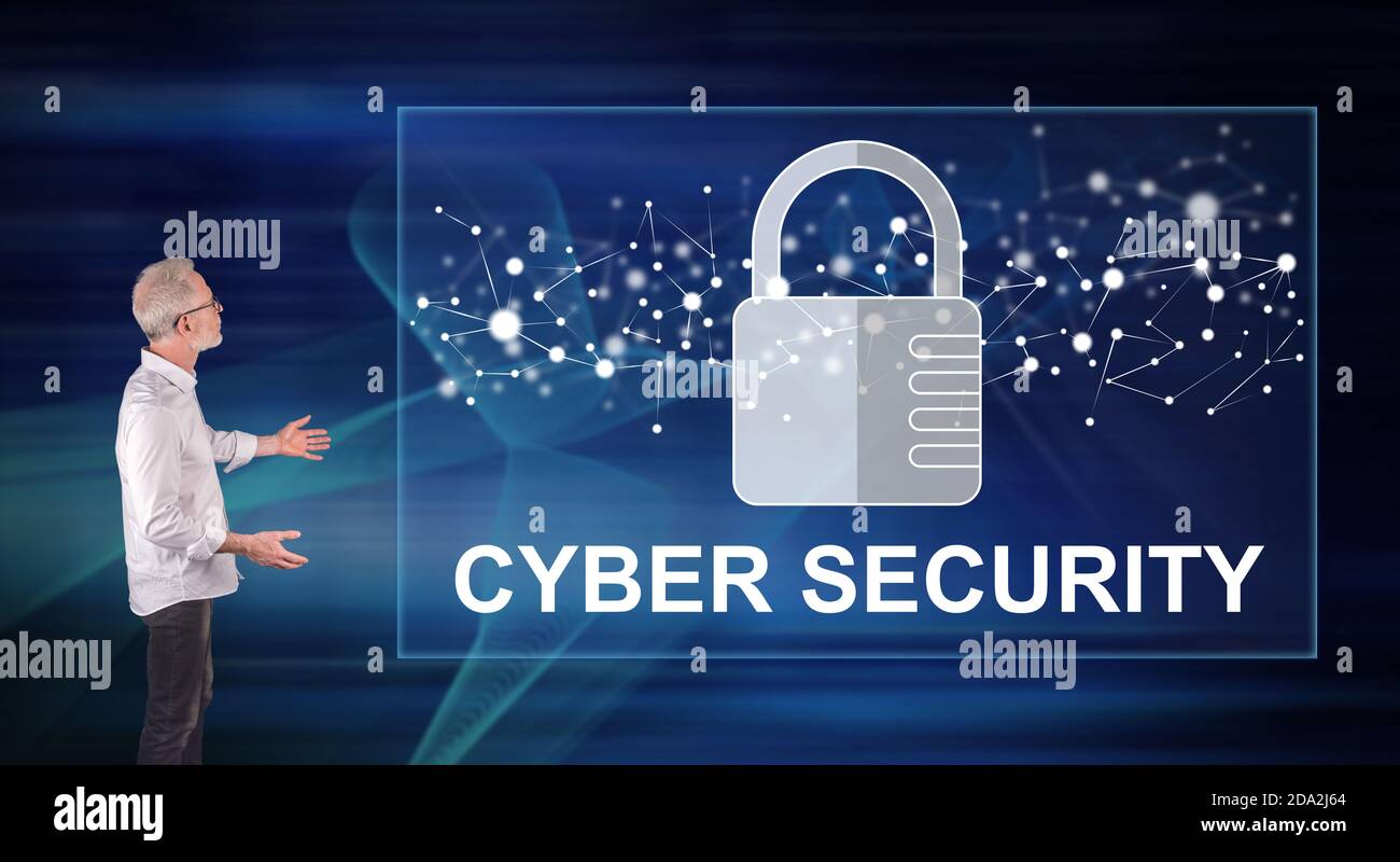 Businessman showing a cyber security concept on a wall screen Stock ...
