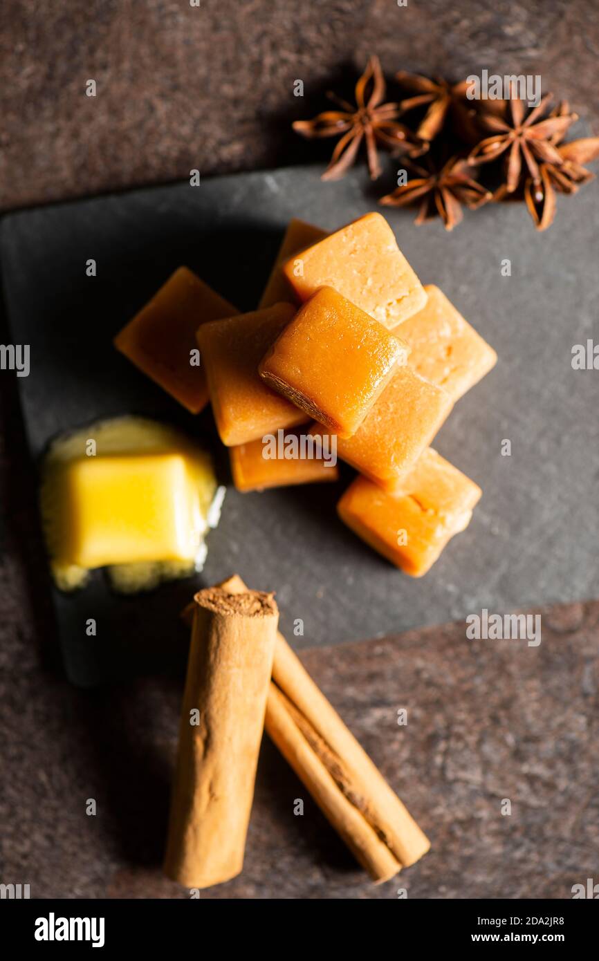 Small pieces of classic butter fudge, food background Stock Photo - Alamy