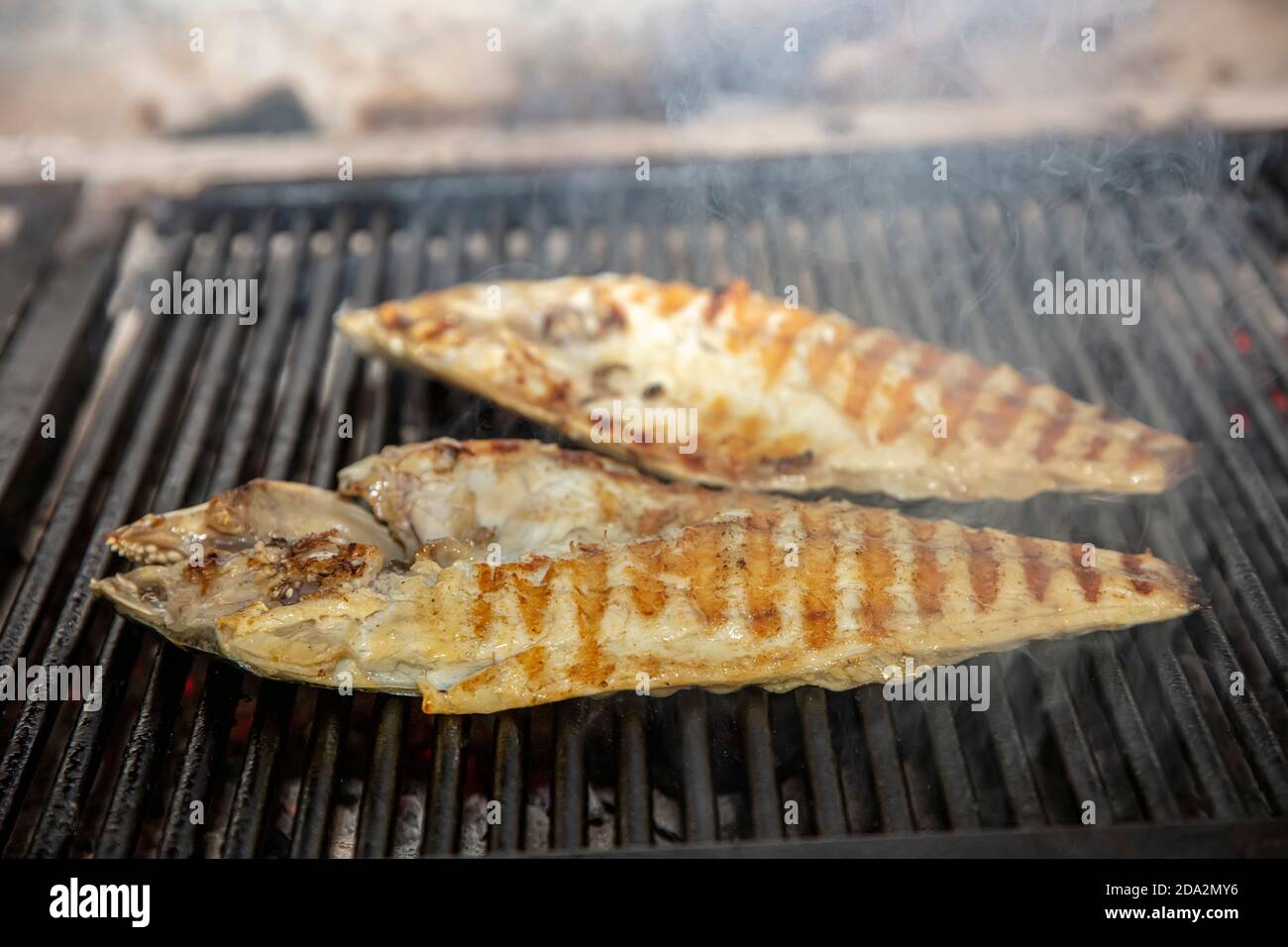 Sea bream fish on the grill. Grilled fish dish sea bream restaurant ...