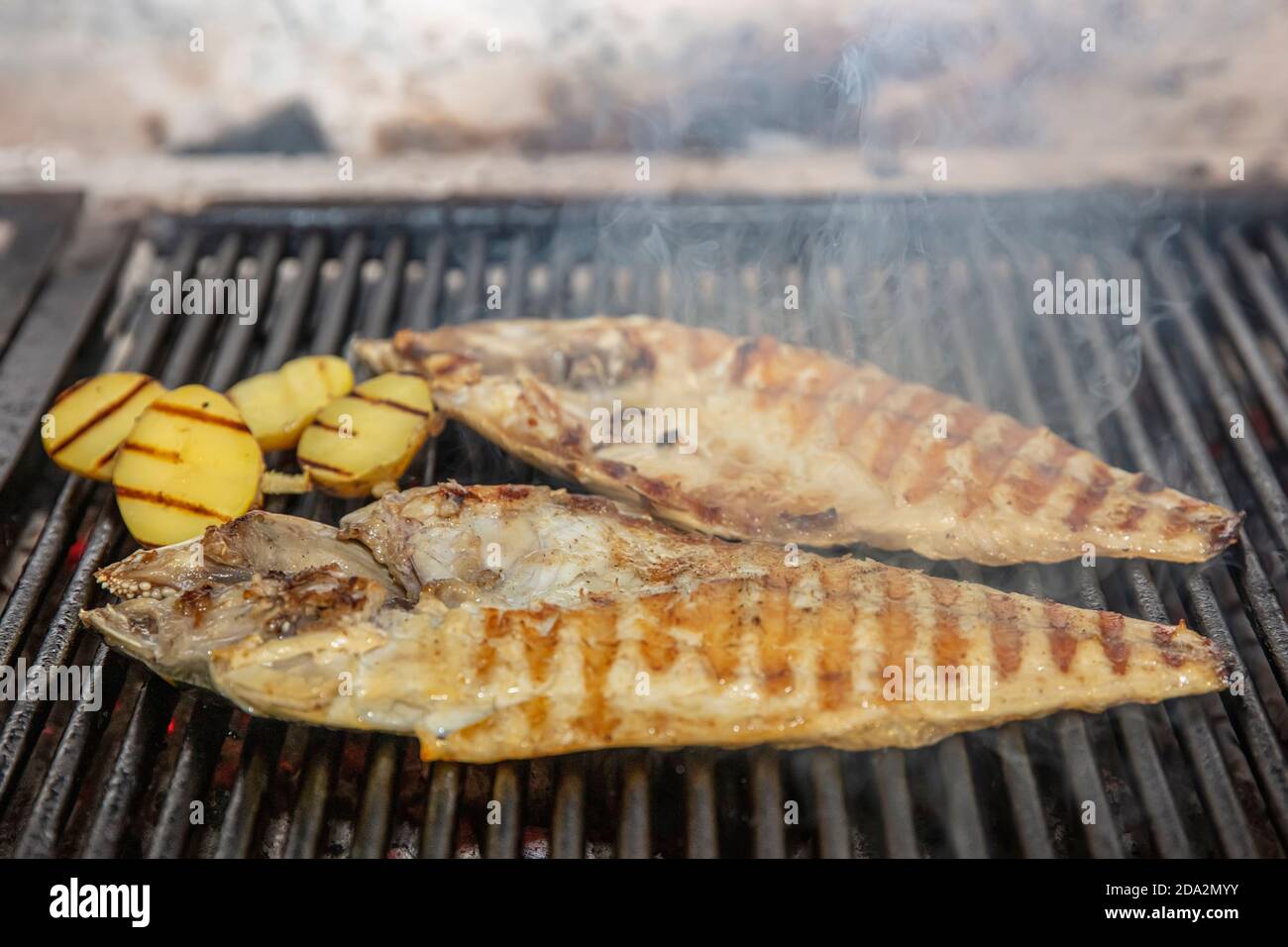 Sea bream fish on the grill. Grilled fish dish sea bream restaurant ...