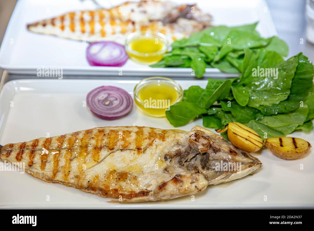 Sea bream fish on the grill. Grilled fish dish sea bream restaurant ...