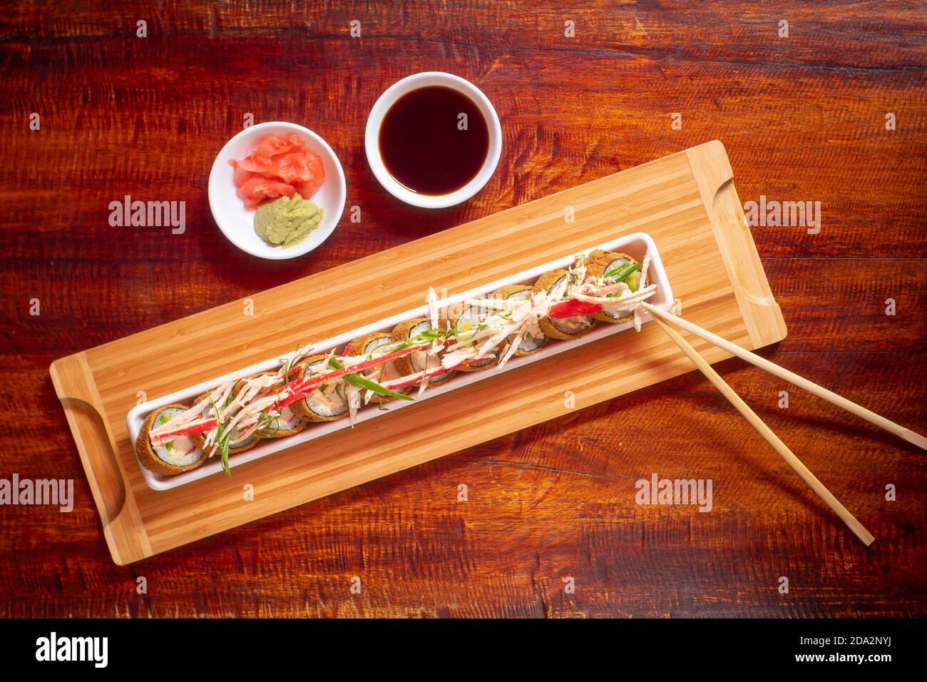 Wooden Table Served with Asian Food Stock Photo - Alamy