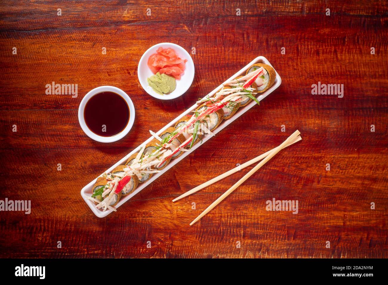 Wooden Table Served with Asian Food Stock Photo - Alamy