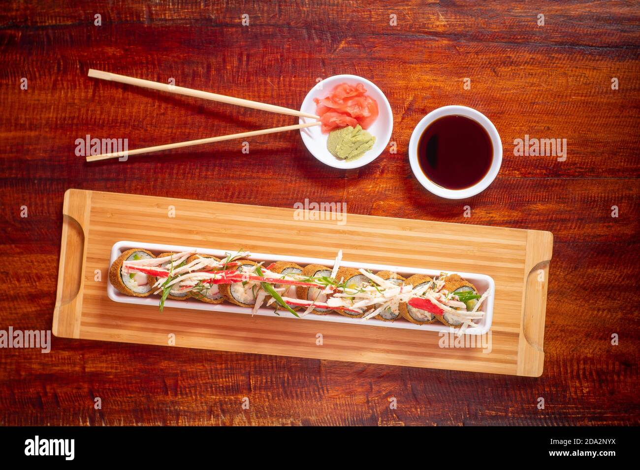 Wooden Table Served with Asian Food Stock Photo - Alamy