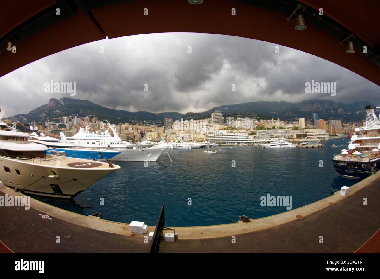 Monaco - view to the harbour through a window Stock Photo - Alamy