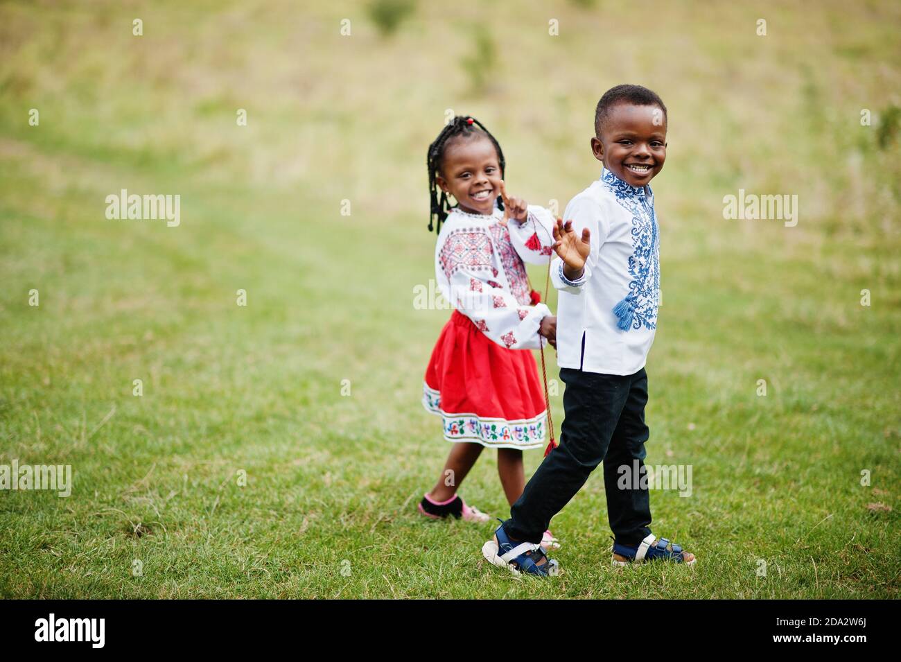 African kids in traditional clothes at park Stock Photo - Alamy