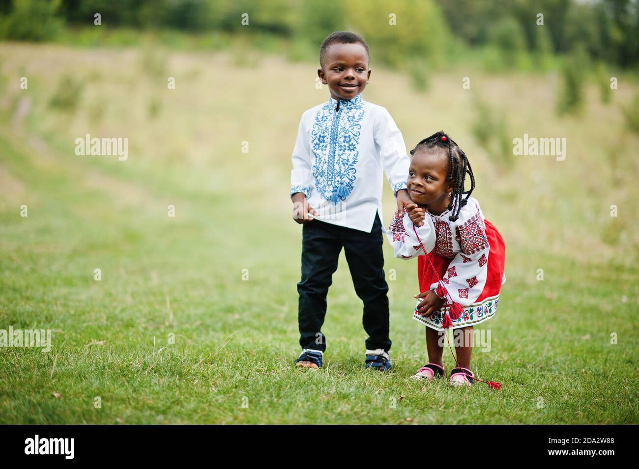 African kids in traditional clothes at park Stock Photo - Alamy