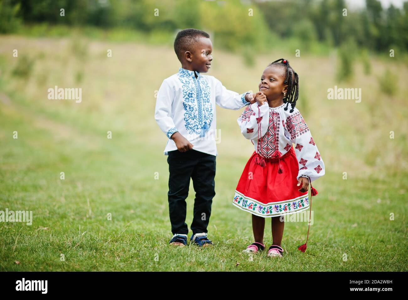 African kids in traditional clothes at park Stock Photo - Alamy