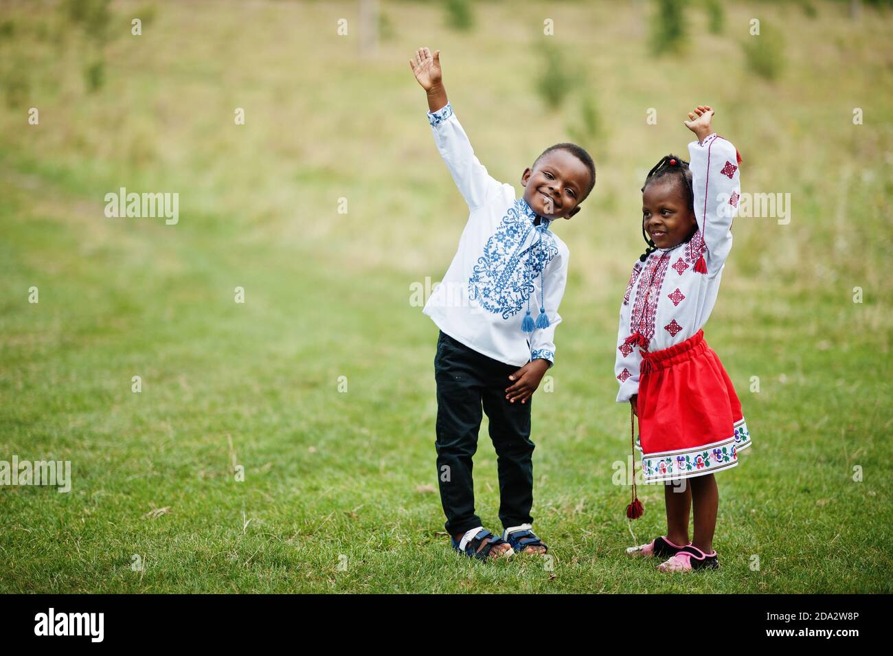 African kids in traditional clothes at park Stock Photo - Alamy
