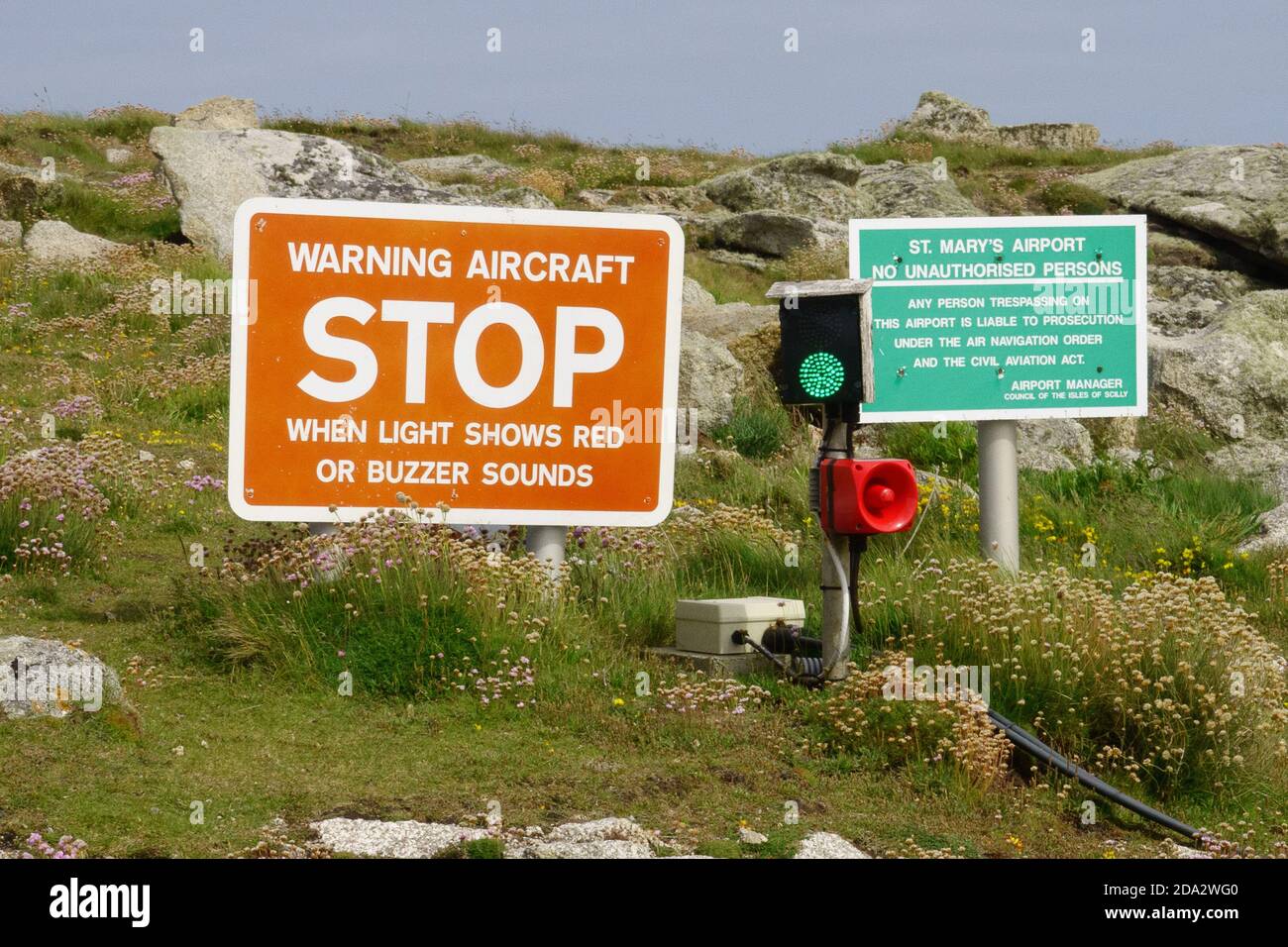 Sign warning Pedestrians of danger from aircraft Stock Photo - Alamy