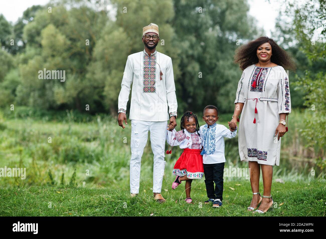 African family in traditional clothes at park Stock Photo - Alamy