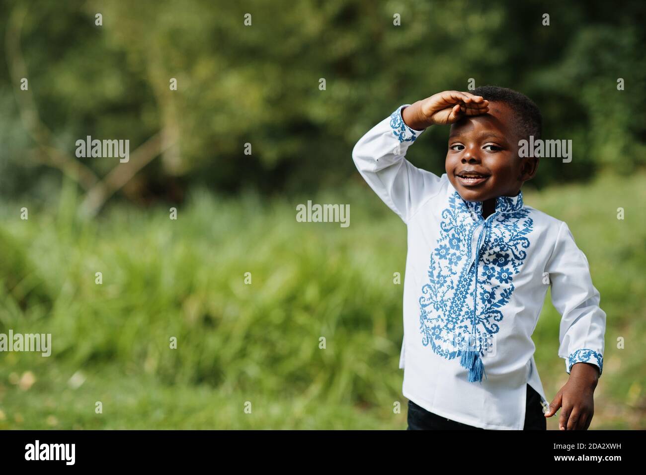 Portrait of african boy kid in traditional clothes at park Stock Photo ...