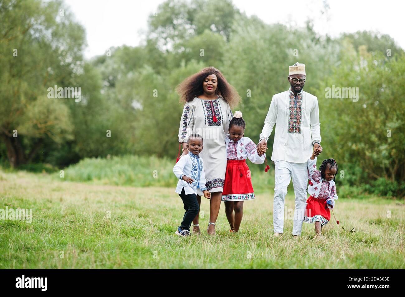 African family in traditional clothes at park Stock Photo - Alamy