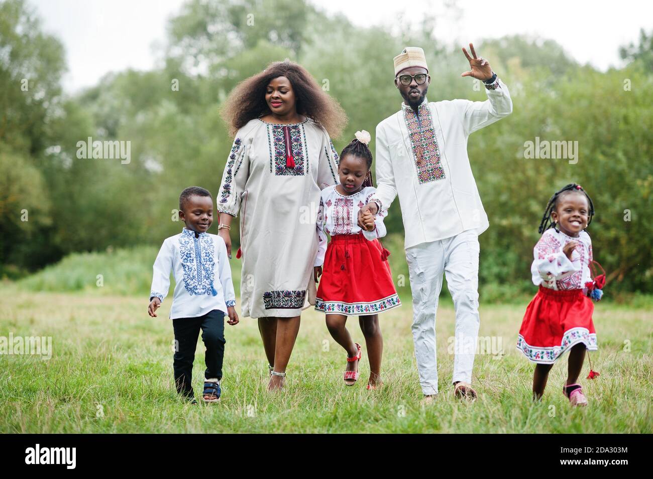 African family in traditional clothes at park Stock Photo - Alamy