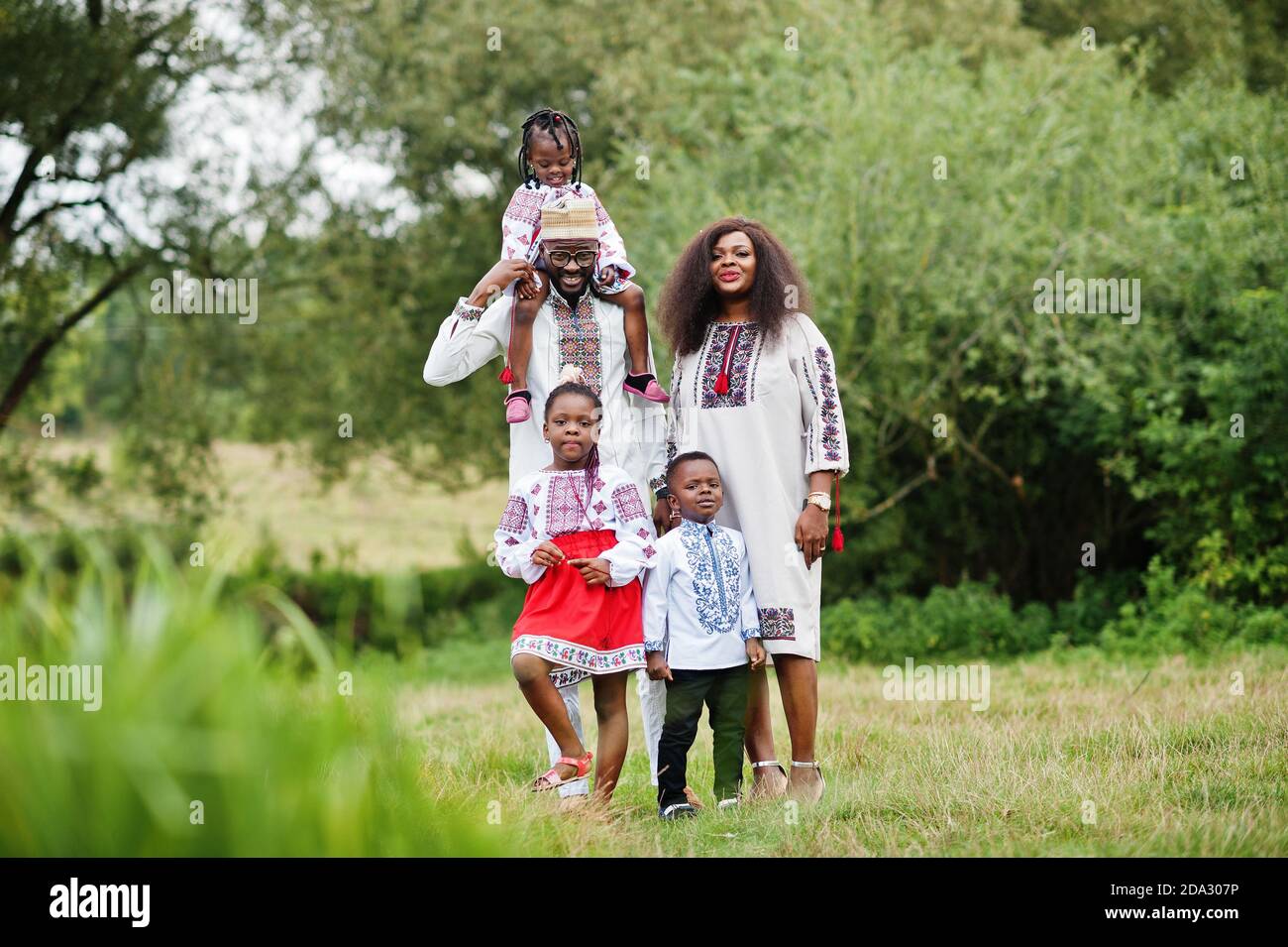 African family in traditional clothes at park Stock Photo - Alamy