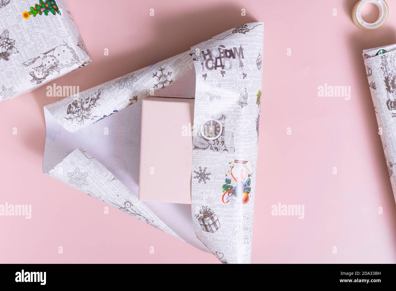 step 3. attach the paper on the long side to the center of the box ...