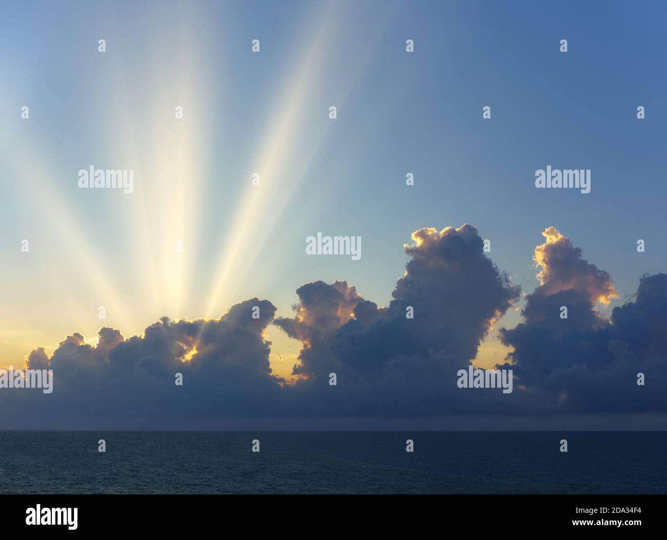 cloudscape with clouds and beautiful sun rays Stock Photo - Alamy