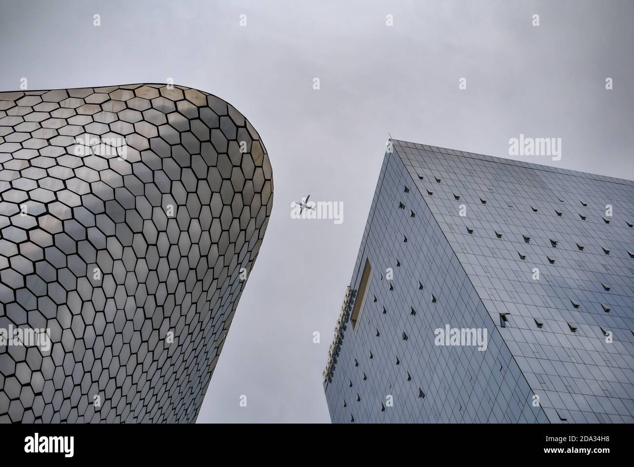 MEXICO CITY, MEXICO - Oct 31, 2020: The flying plane between two ...