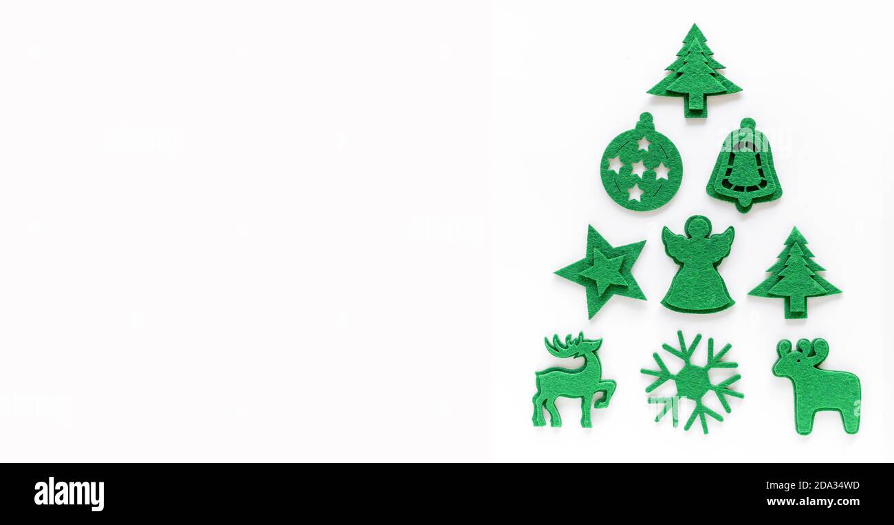 Creative christmas tree layout made from felt decorations. Flat lay ...