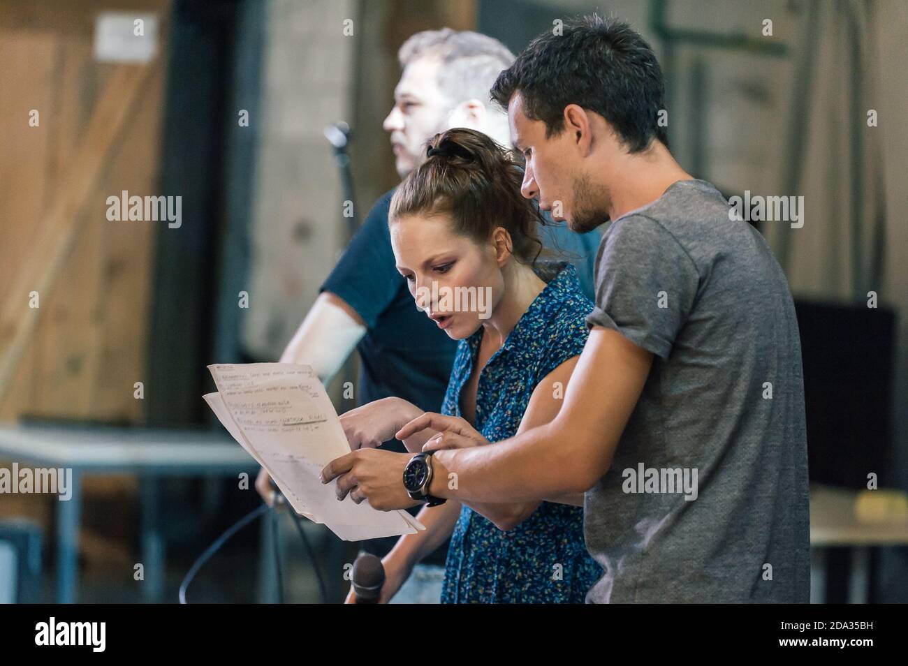Behind the scene. Director of the play rehearses the play with the ...