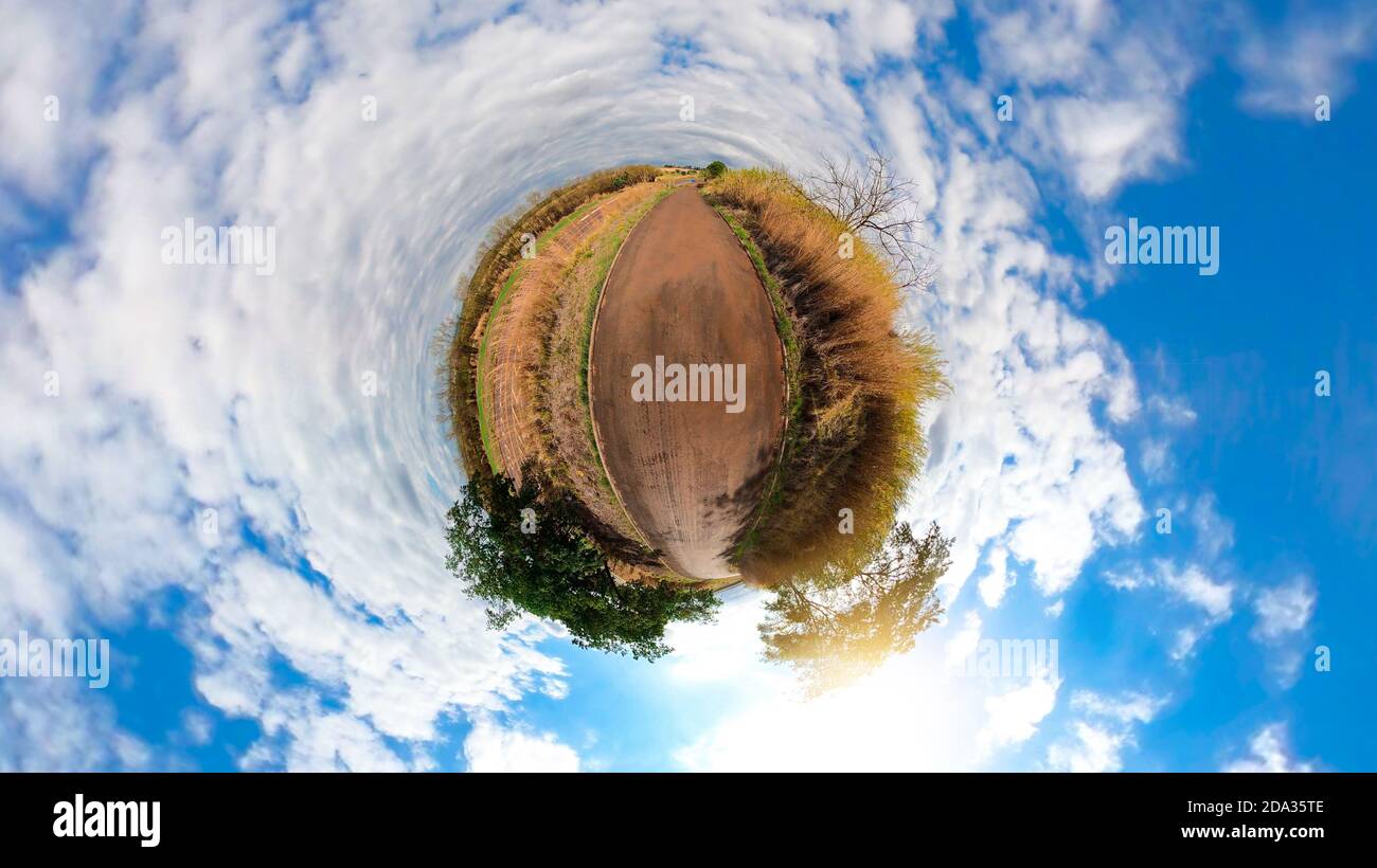 Small planet with trees, white clouds and soft blue sky. Green 360 Tiny ...